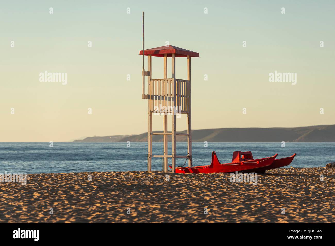 Salvataggio lifeguard watchtower and lifeboat on the sandy beach of ...