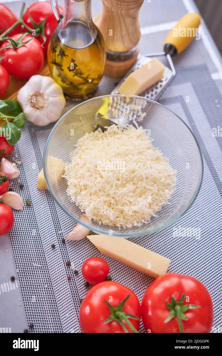 Grating parmesan pasta hi-res stock photography and images - Alamy