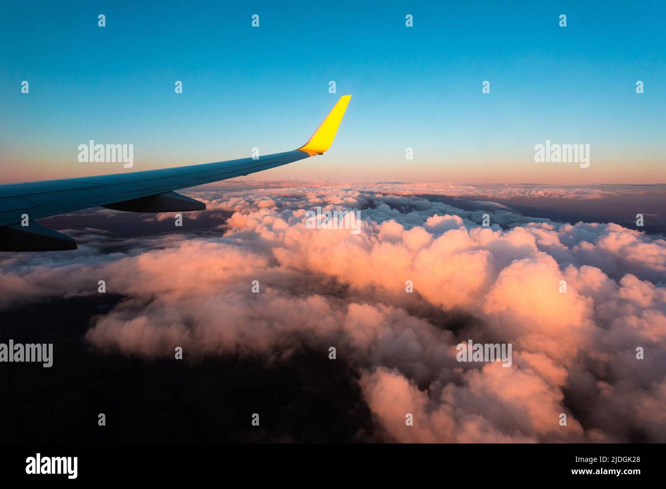 Stunning sunset from the window of the aircraft during the flight Stock ...