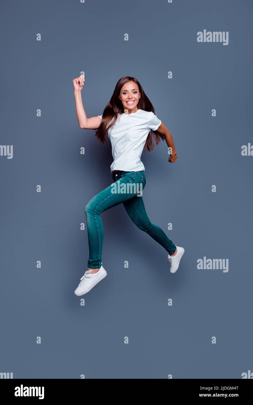 Full body portrait of active satisfied lady jump running rush fast have ...