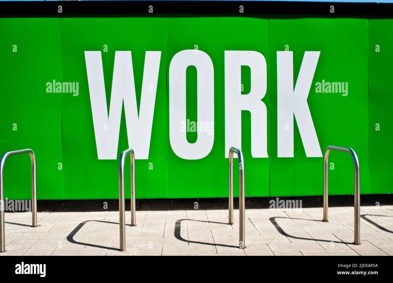 Work Slogan, Polar, London, England Stock Photo - Alamy