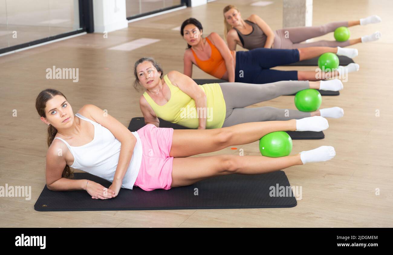 Group of women exercising with bender ball Stock Photo - Alamy