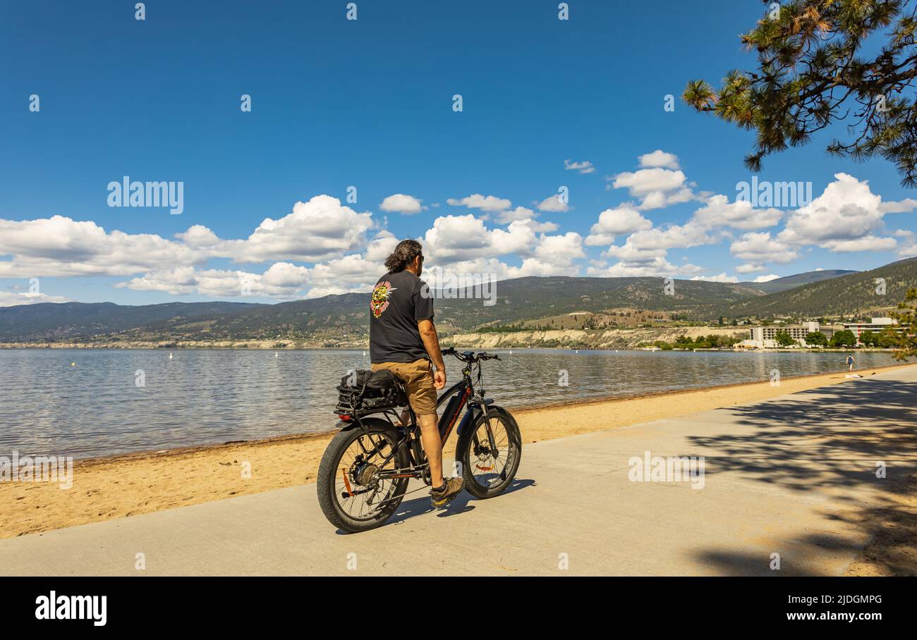 Man With Bicycle Relaxing On Shore On Summer Travel Beach Vacation ...
