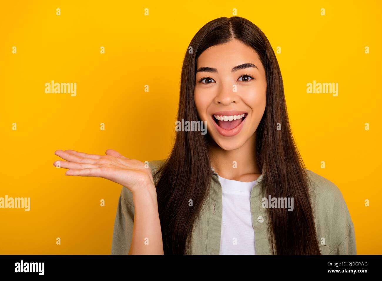 Photo of adorable good mood overjoyed female recommend suggest product ...