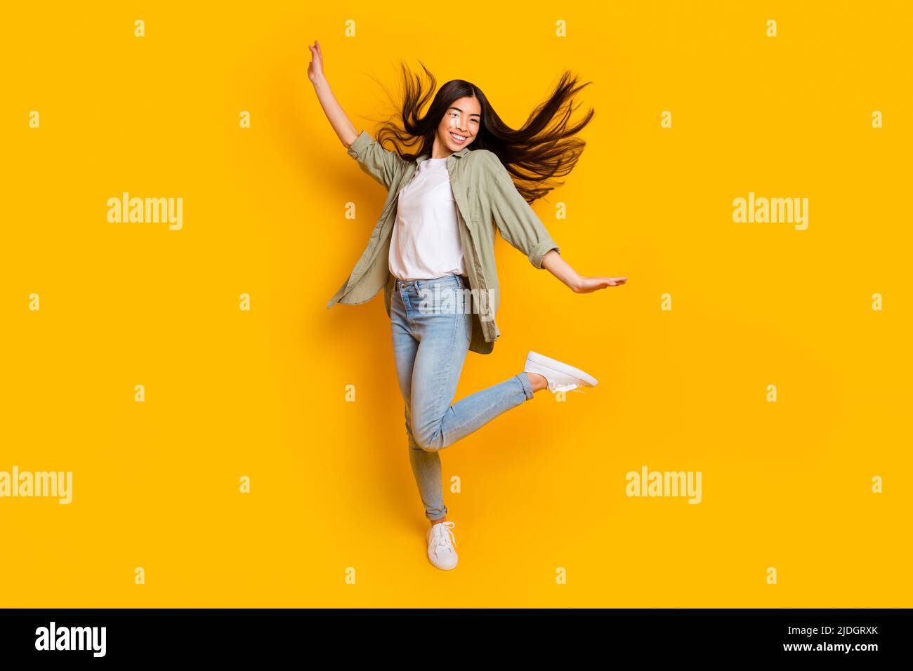 Full body portrait of positive overjoyed girl enjoy dancing clubbing ...