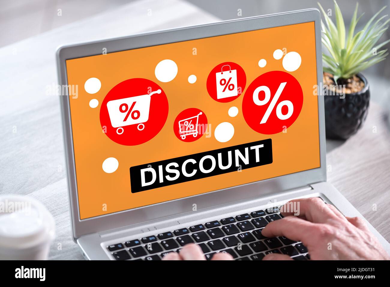 Laptop screen displaying a discount concept Stock Photo - Alamy