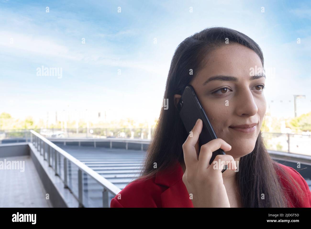 Business woman, smiling business woman talking with phone in the ...
