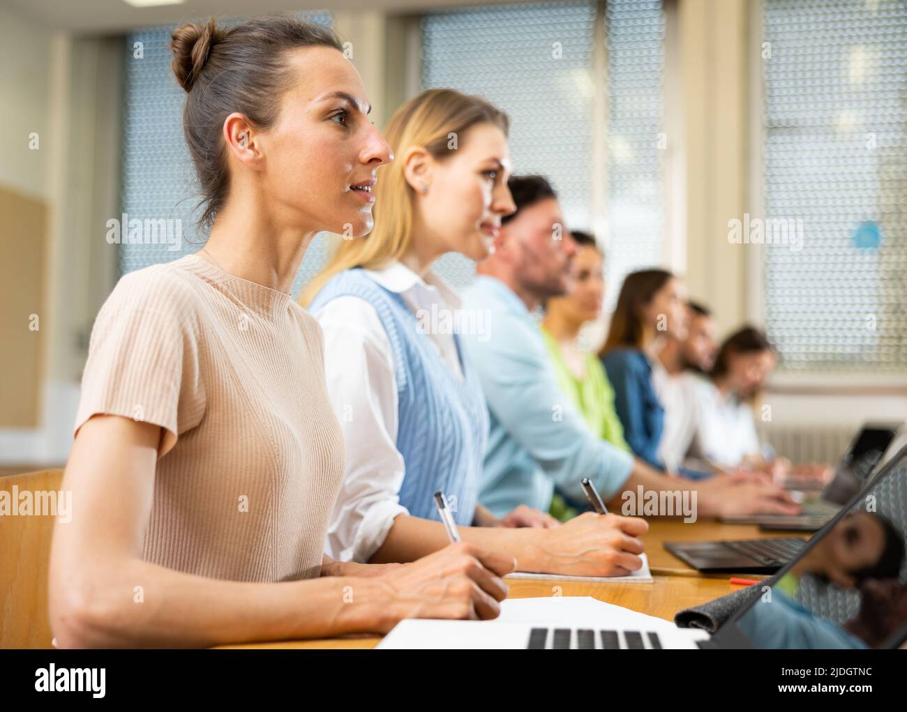 Portrait of a girl student studying during and writing a synopsis Stock ...