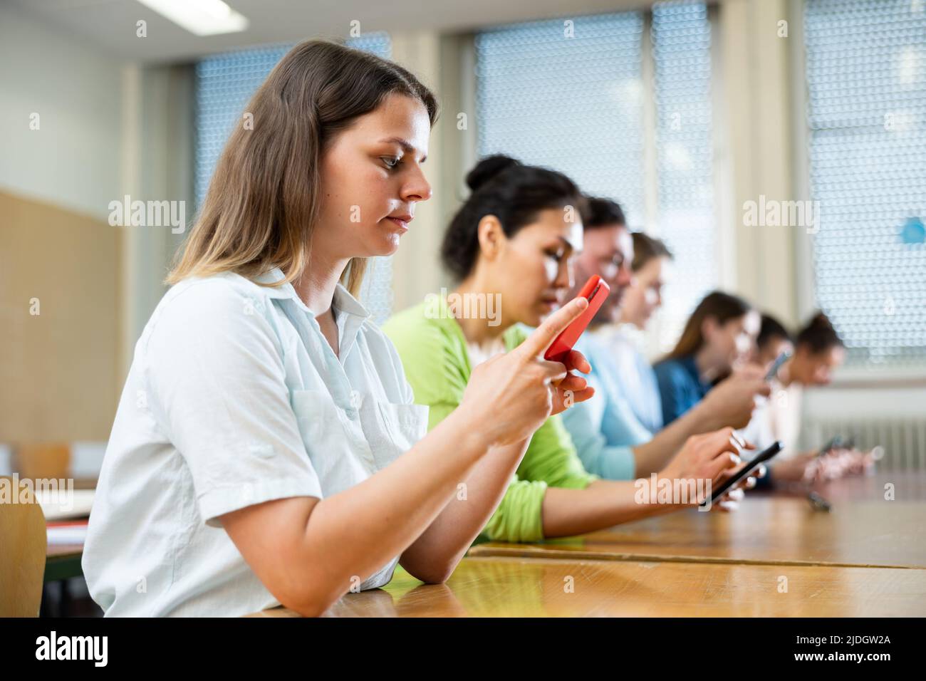 University student using smartphone hi-res stock photography and images ...