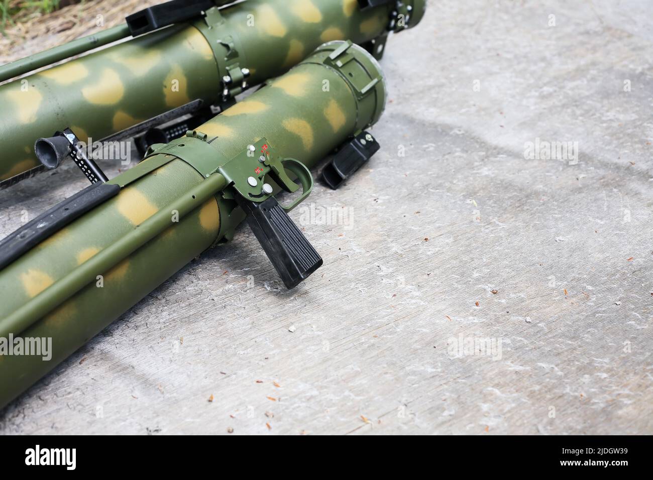 Pair of modern rocket propelled grenades on gray background with free ...
