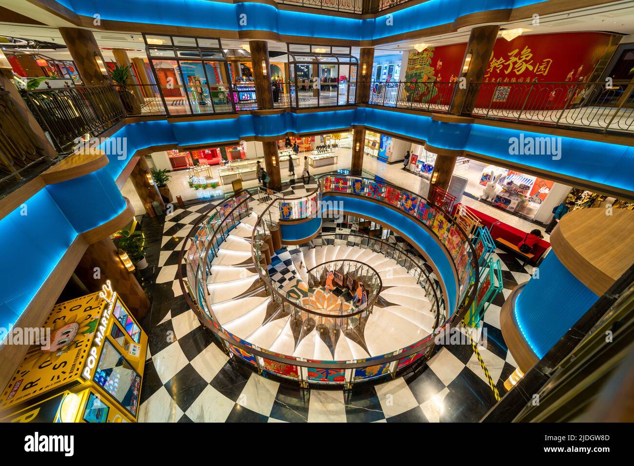 The view a nautilus staircase inside a shopping mall in Yu Yuan Stock ...