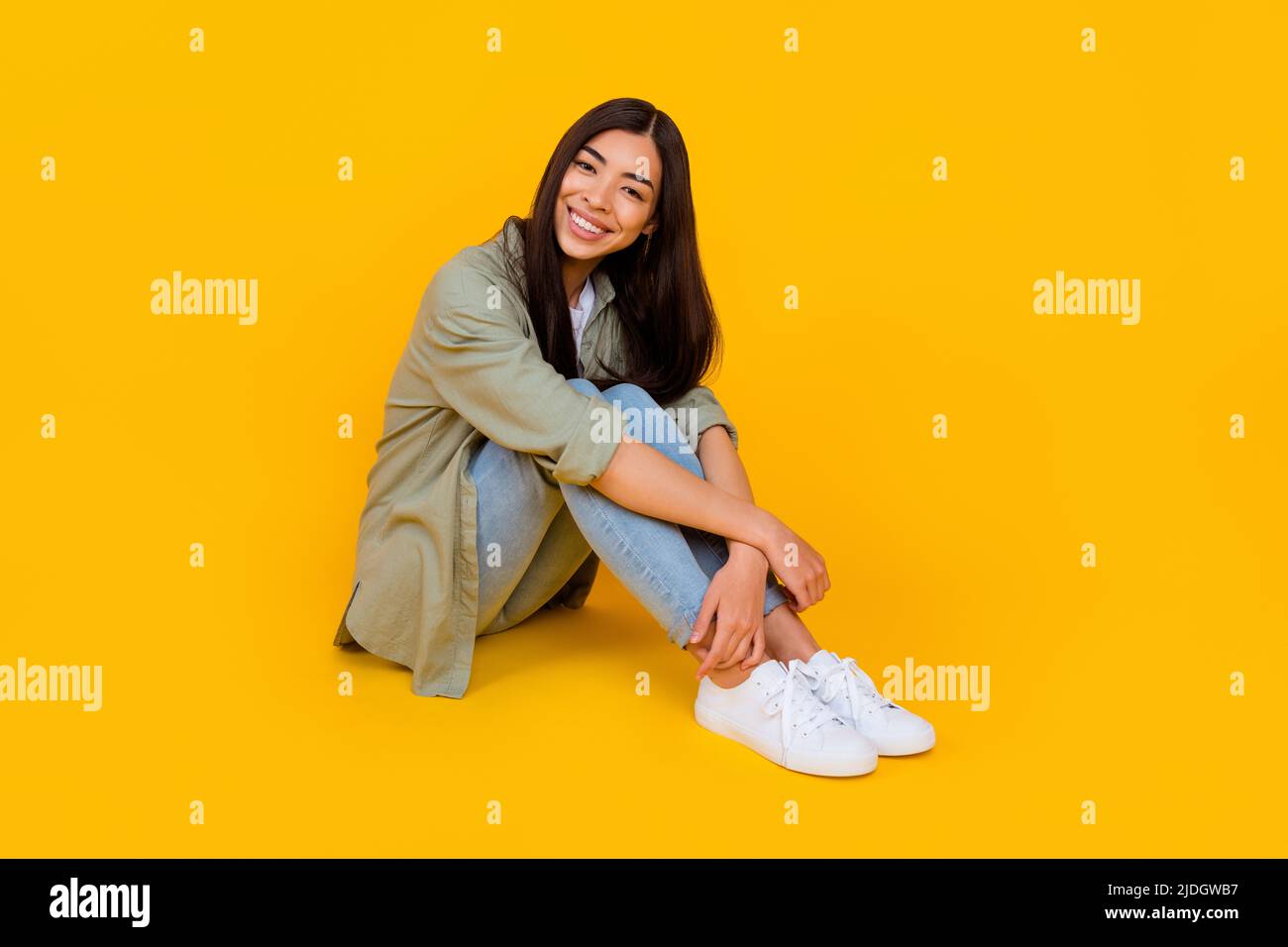 Full body portrait of adorable cheerful friendly person sit floor ...