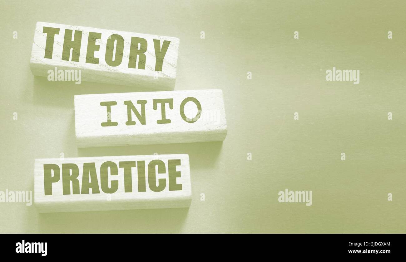 Theory into practice words written on wooden blocks. Education or business startup concept Stock ...
