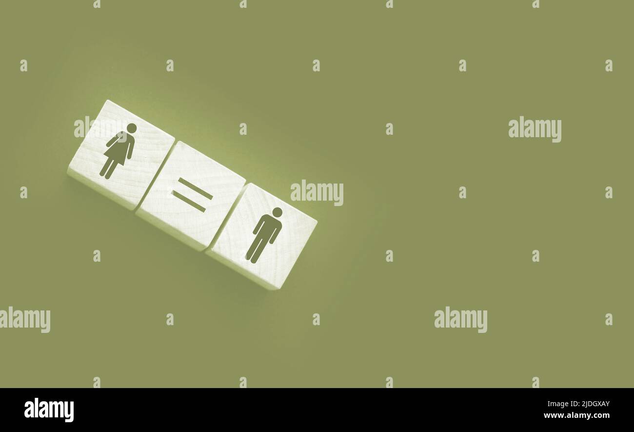 Concepts of gender equality. wooden cubes with female and male symbol ...