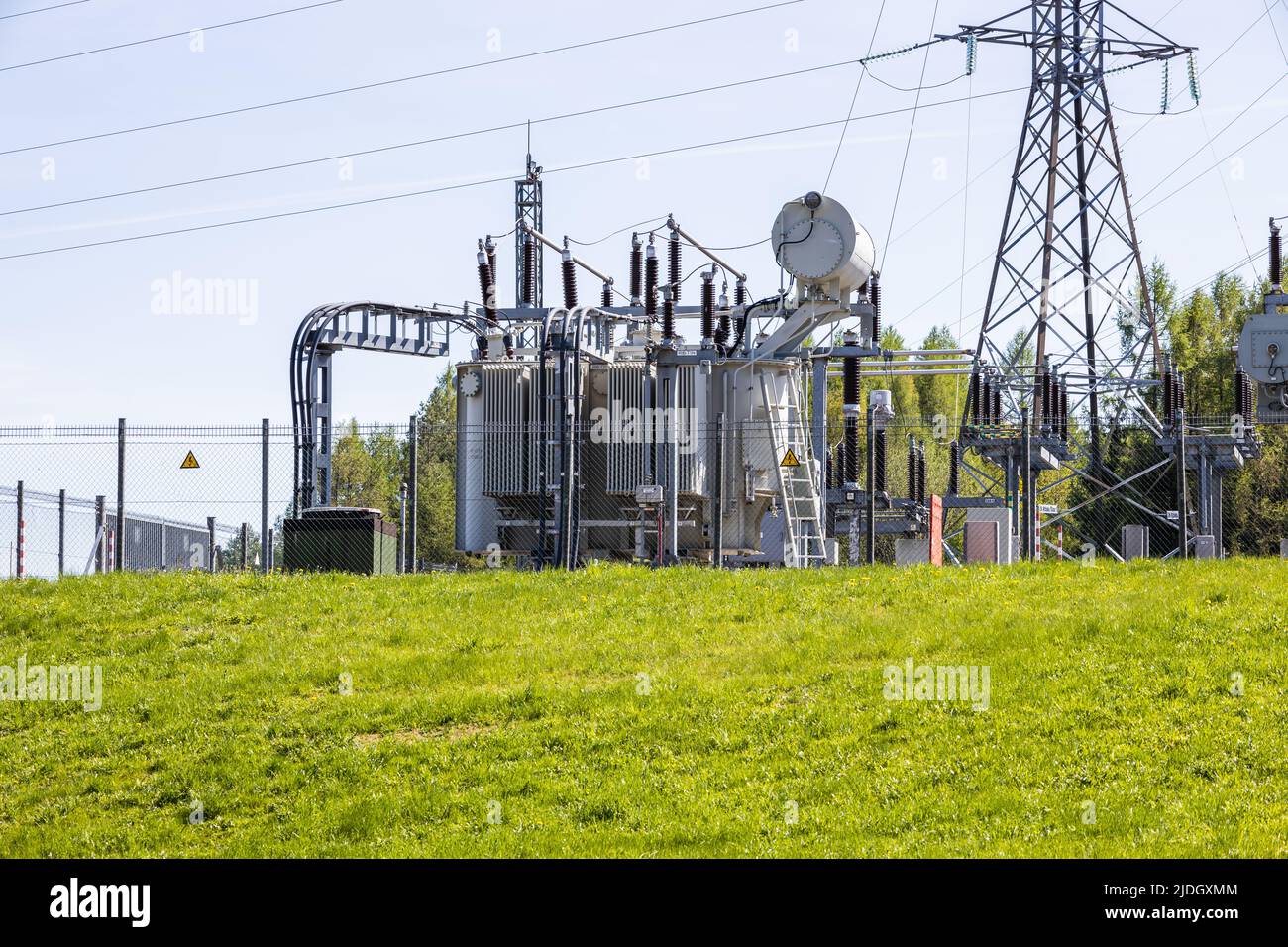 High voltage electricity towers, transmission power lines, cables on ...