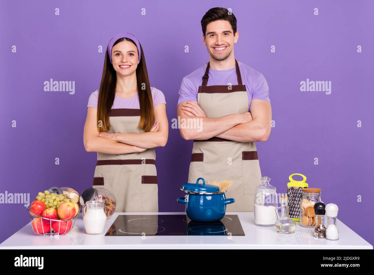 Photo of cute funky boyfriend girlfriend dressed chef ready for cooking ...