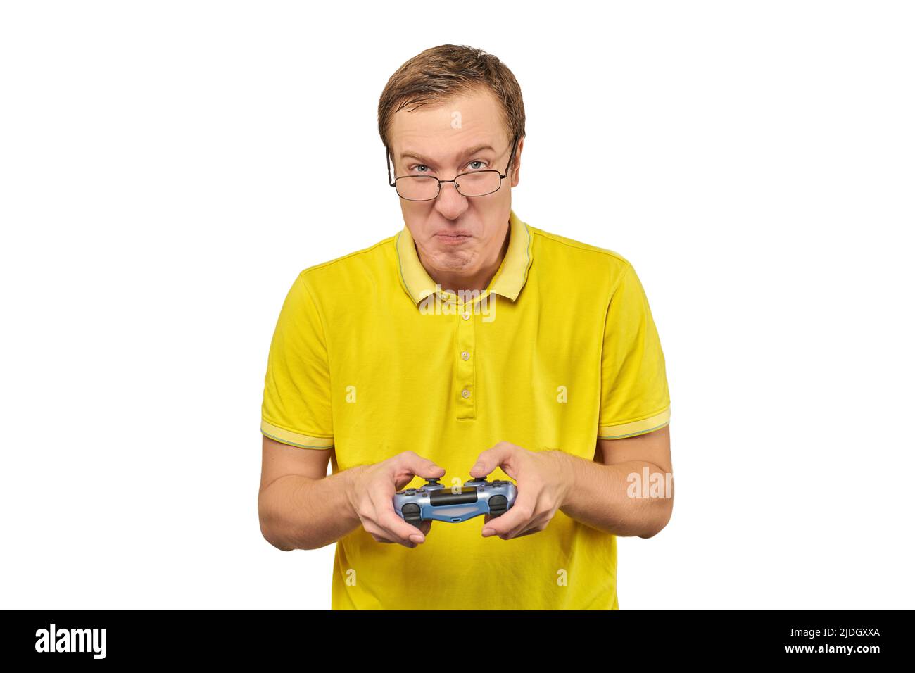 Geek gamer nerd in glasses and yellow T-shirt with gamepad isolated on ...