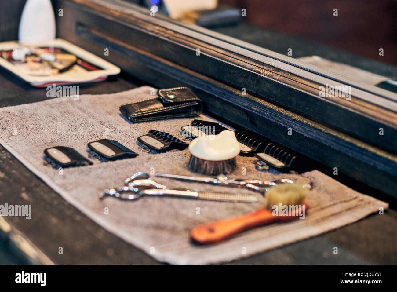 Barbershop haircut tools barber equipment on wooden countertop front of ...