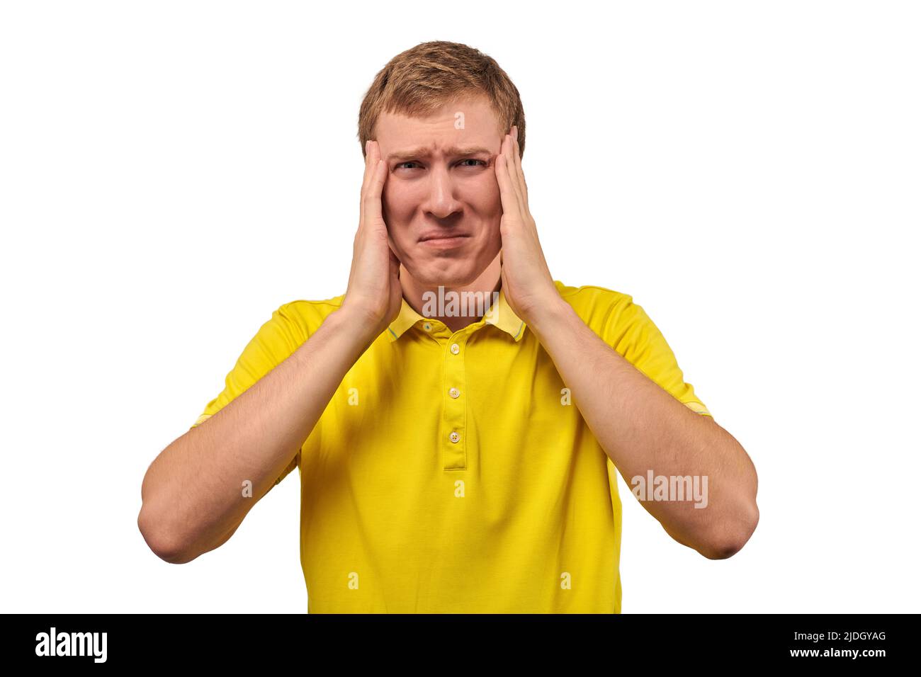 Upset man in yellow T-shirt clutched at his head, forgetful man with ...