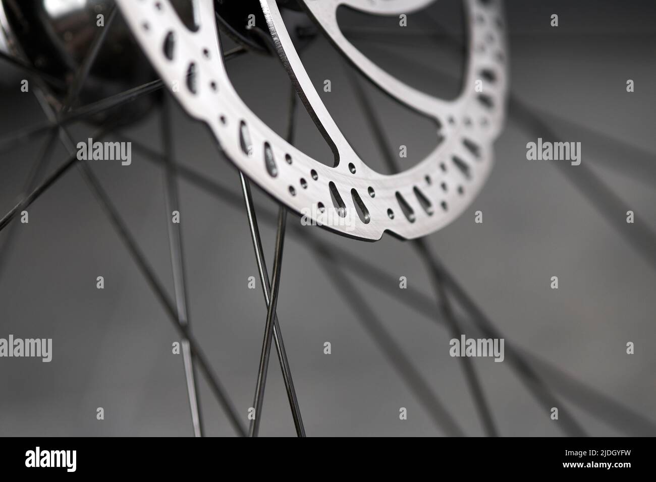 Hydraulic bicycle disk brakes, grey metal disc attached to bike wheel ...