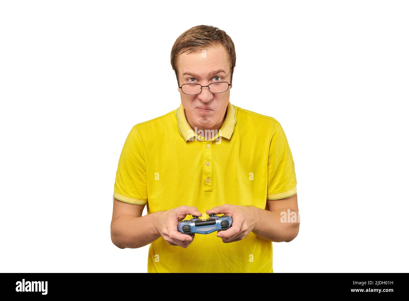 Geek gamer nerd in glasses and yellow T-shirt with gamepad isolated on ...