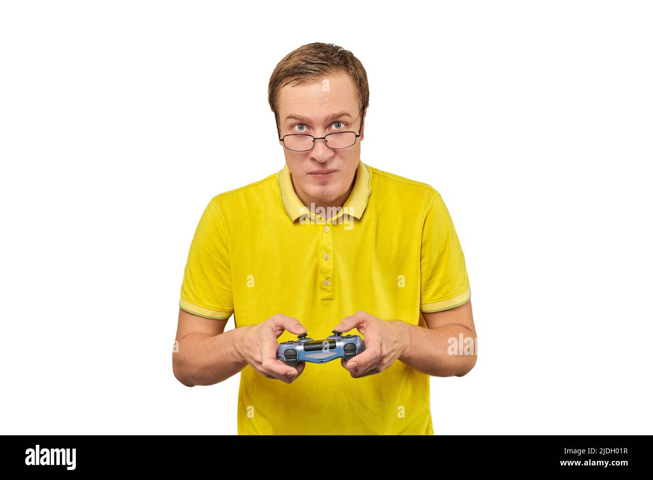 Geek gamer nerd in glasses and yellow T-shirt with gamepad isolated on ...