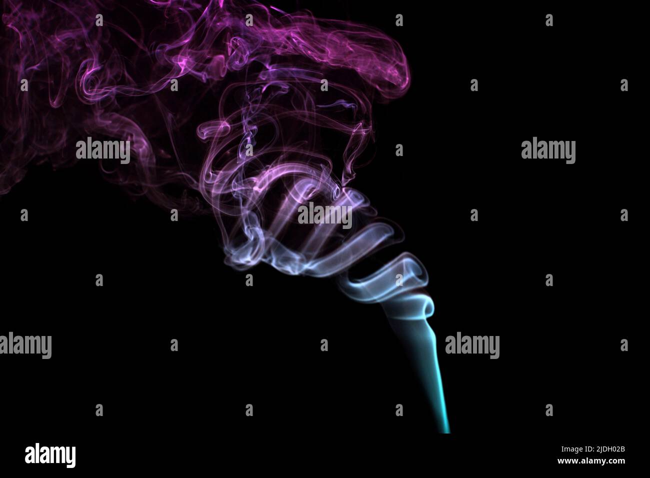 Multicolored smoke for aromatherapy and relaxation on black background ...