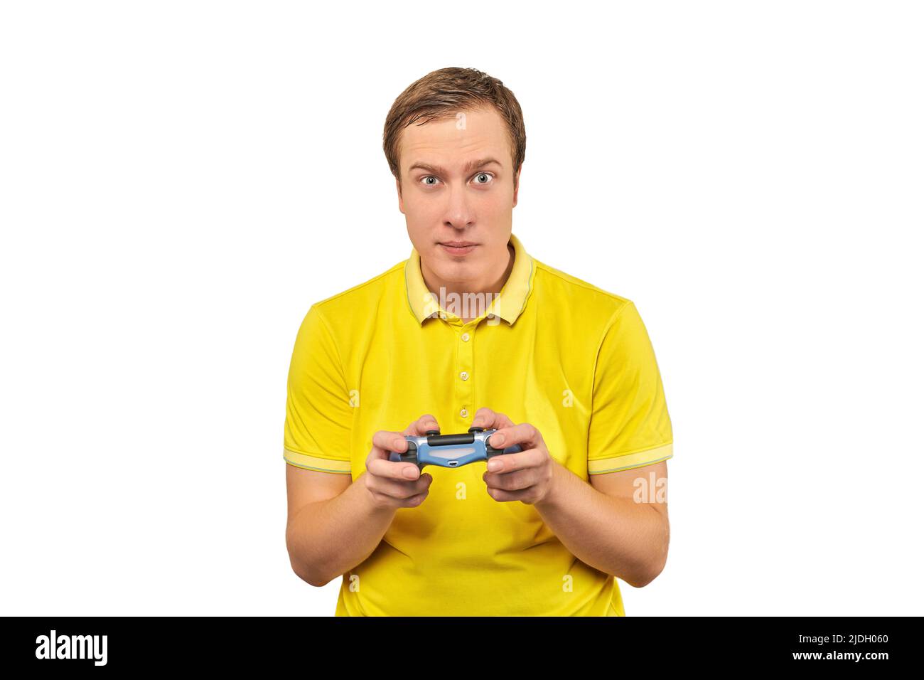 Funny attractive gamer in yellow T-shirt with gamepad isolated on white ...