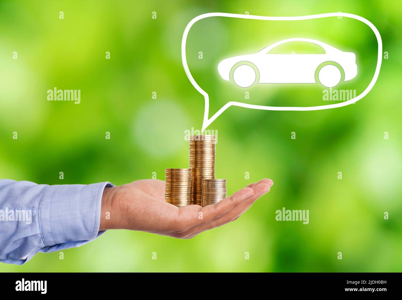Close up photo of stacked coins and car as a symbol of vehicle buy ...