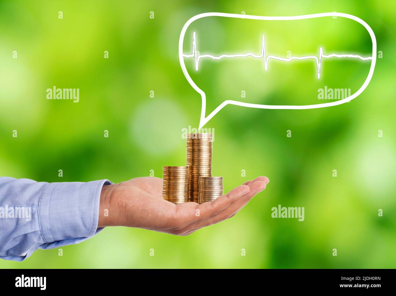 Close up photo of stacked coins and heart rate as a symbol of health ...