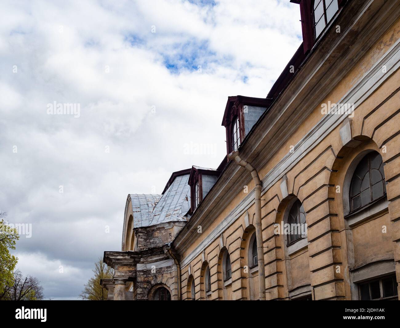 old abandoned decaying building under gray clouds (archive of the Navy ...