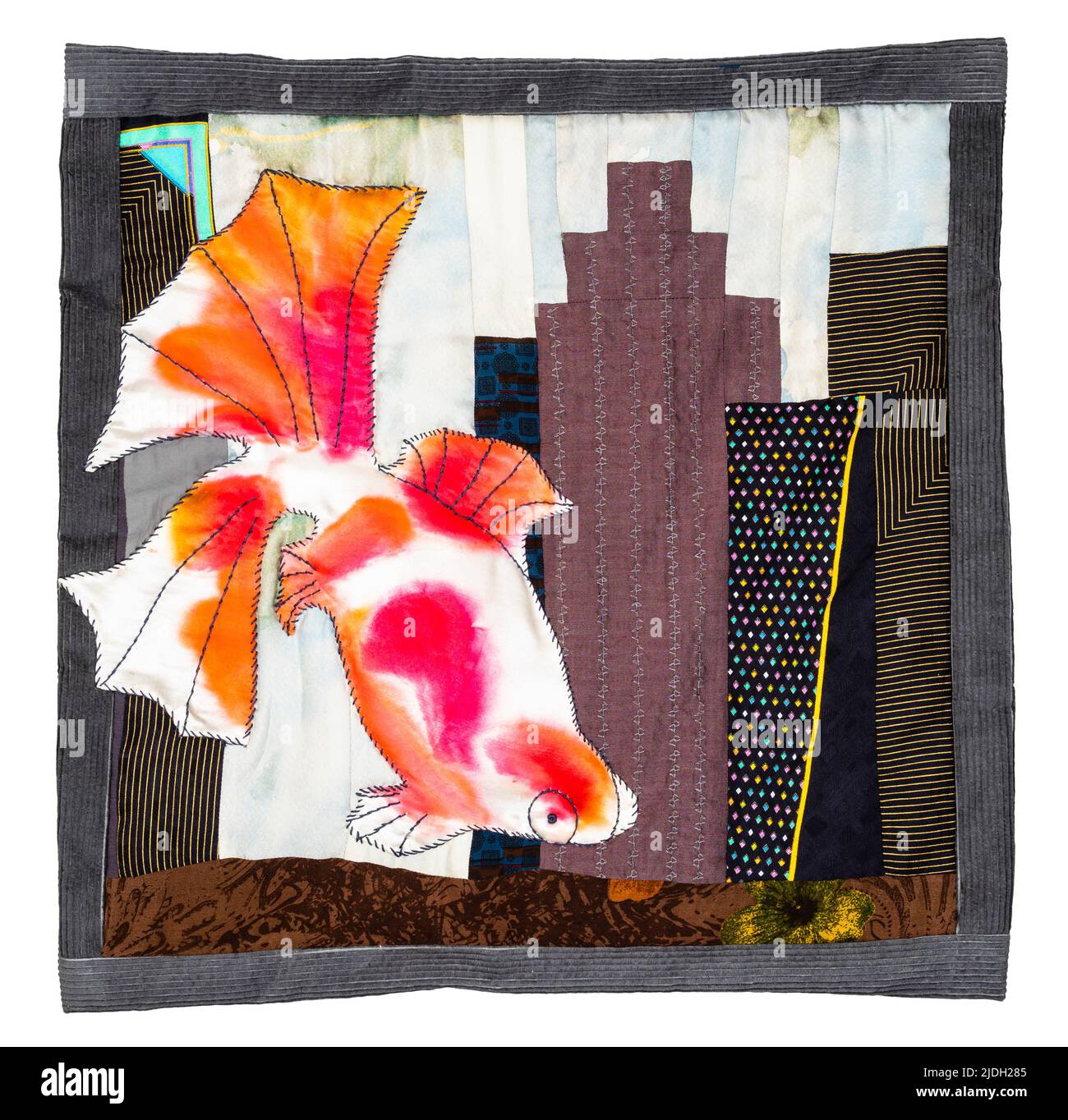 patchwork pillowcase with stitched fish and embroidered cityscape with ...