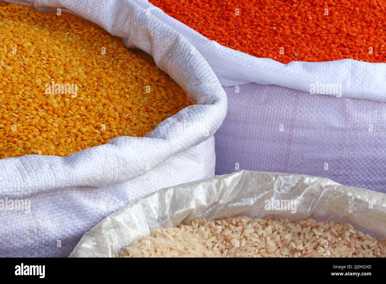 Dried legumes in sacks at the market Stock Photo - Alamy