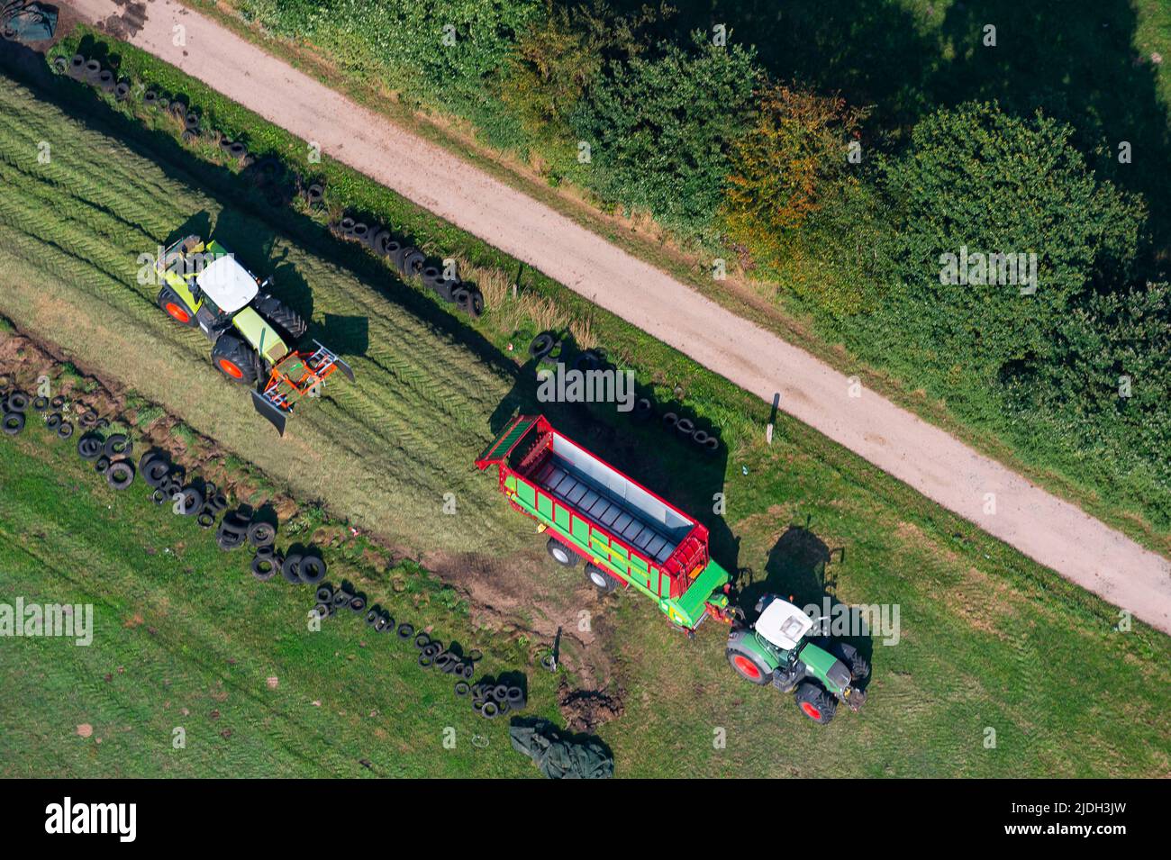 Tractors working on the field, aerial view 05/06/2022, Germany ...