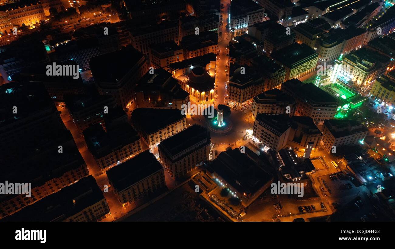Top drone aerial night view of city downtown with yellow lights, Horsh ...