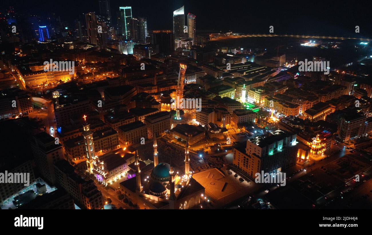 Top drone aerial night view of city downtown with yellow lights, Horsh ...