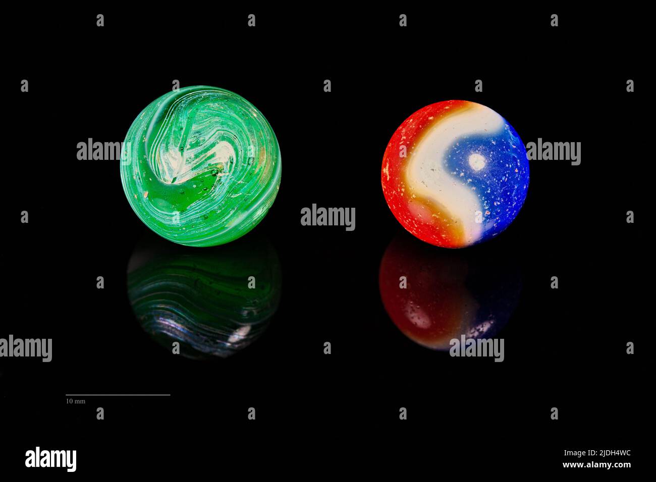 Two different marbles hi-res stock photography and images - Alamy
