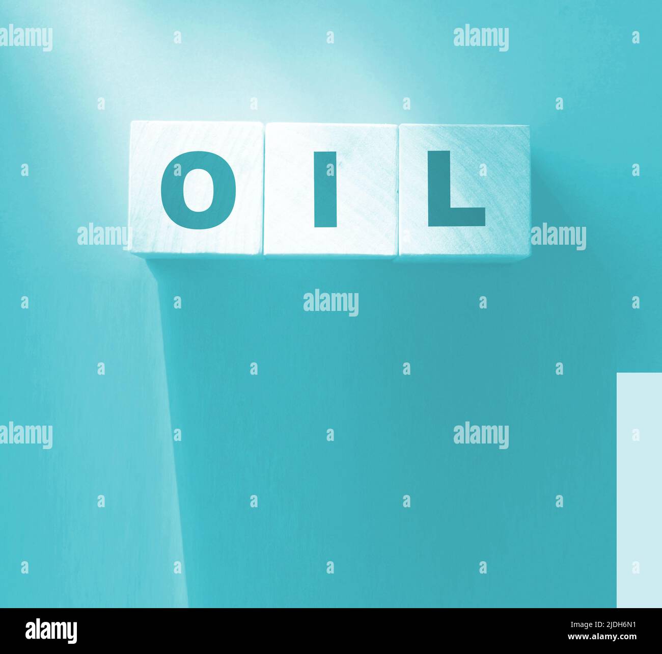 word OIL on cube blocks on red. World Economics business concept Stock ...