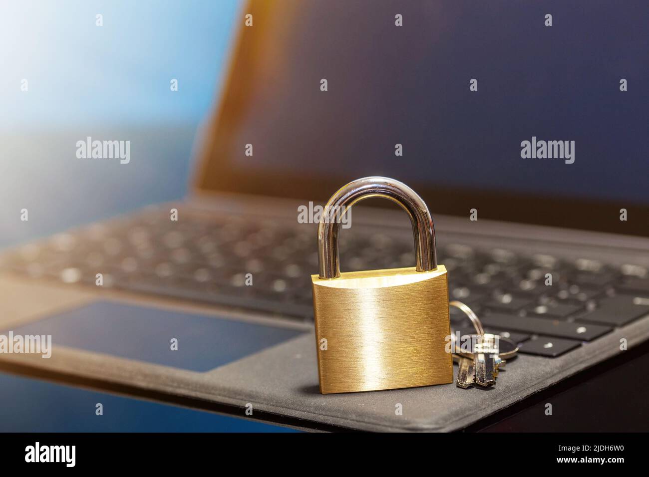 Padlock on a keyboard as a symbolic image for internet security, hacker ...