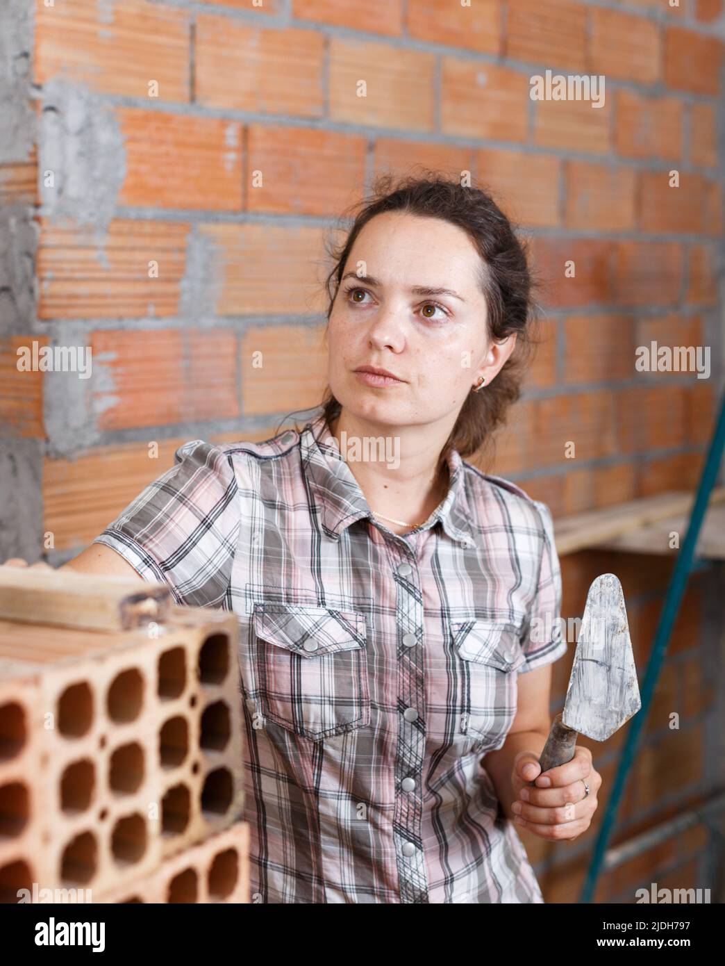 Woman homeowner hi-res stock photography and images - Alamy