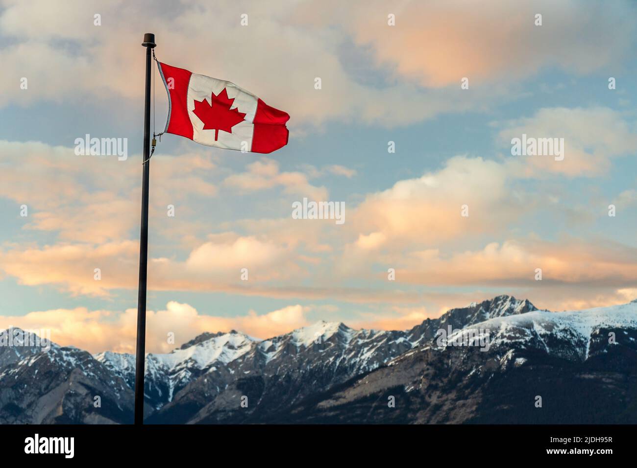 National Flag of Canada with natural mountains and trees scenery in the ...