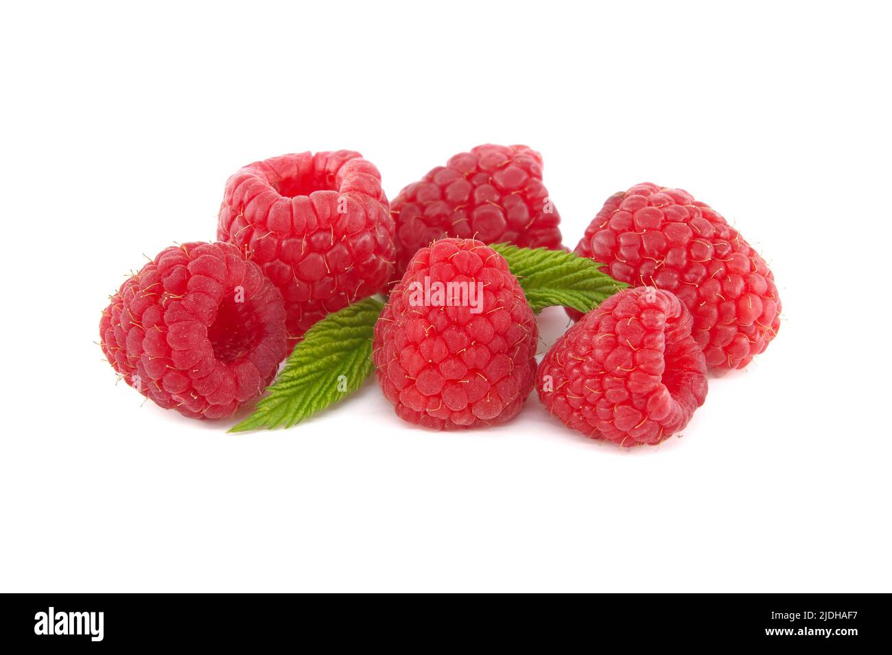 Red ripe raspberry berries with green leaves. Side view, isolated on ...