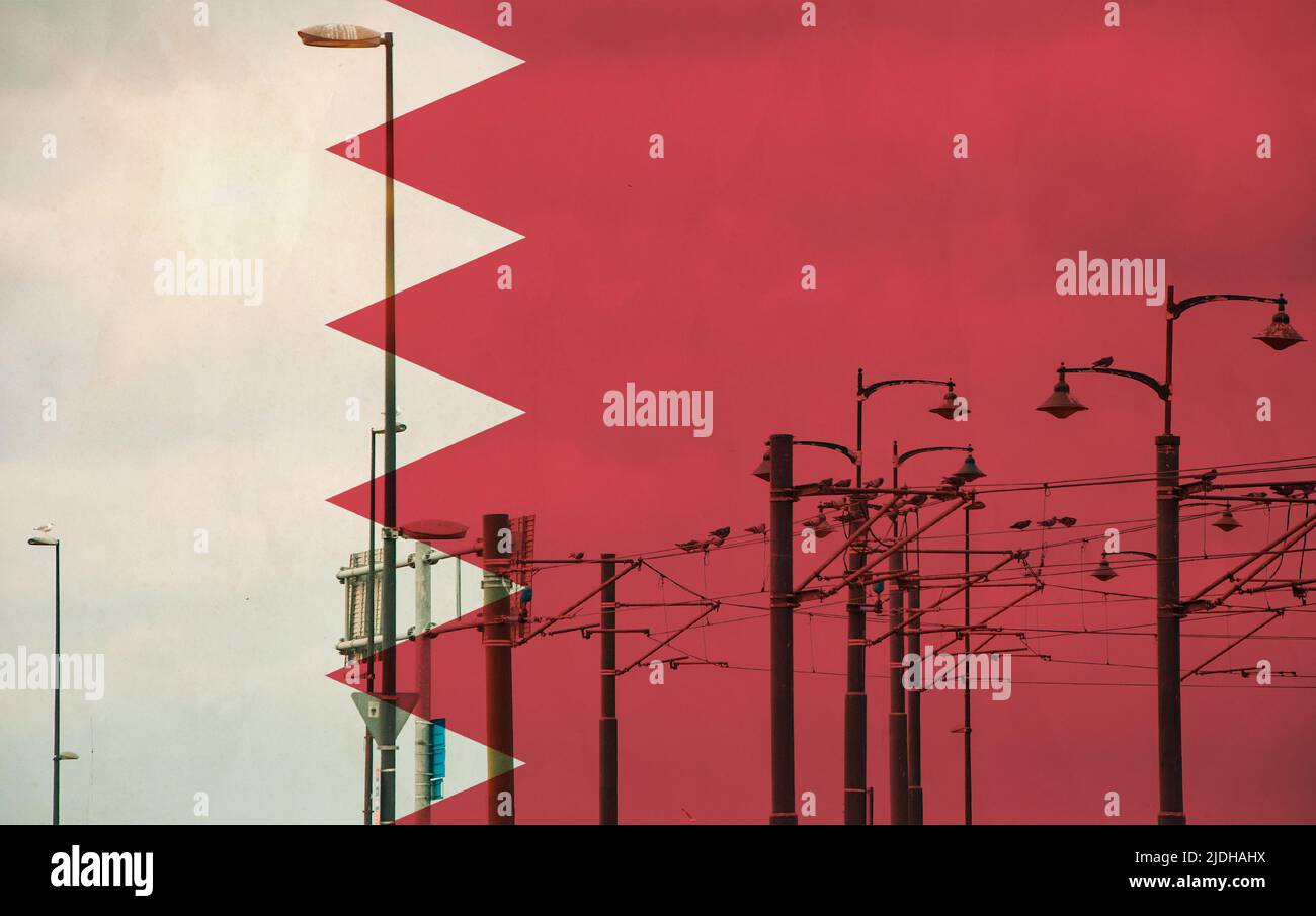 Bahrain flag with tram connecting on electric line with blue sky as ...