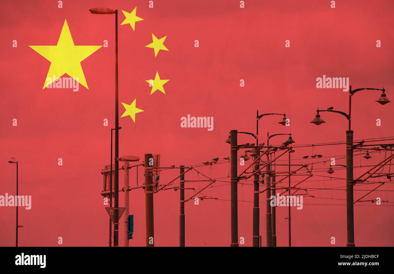 China flag with tram connecting on electric line with blue sky as ...