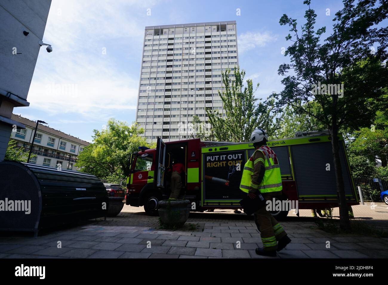 Fire crew in front of tower block at Stebbing House on Queensdale ...