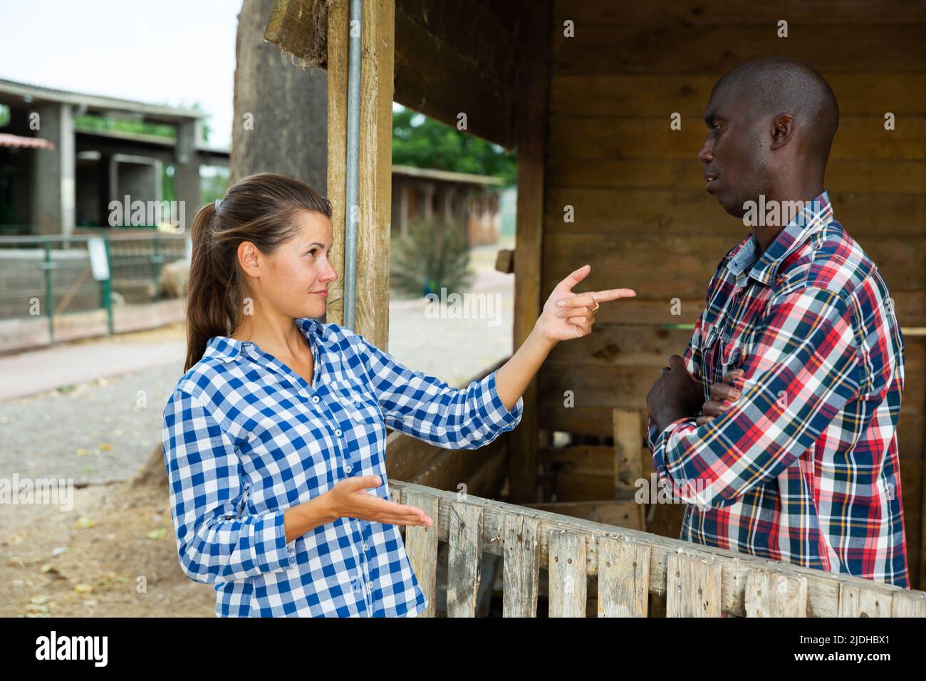 Angry woman quarreling with neighbor Stock Photo - Alamy