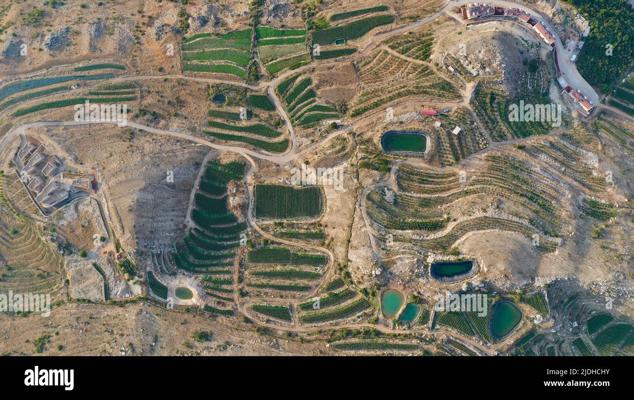 Green mountainous fields and roads in semi-desert, Mount Lebanon ...