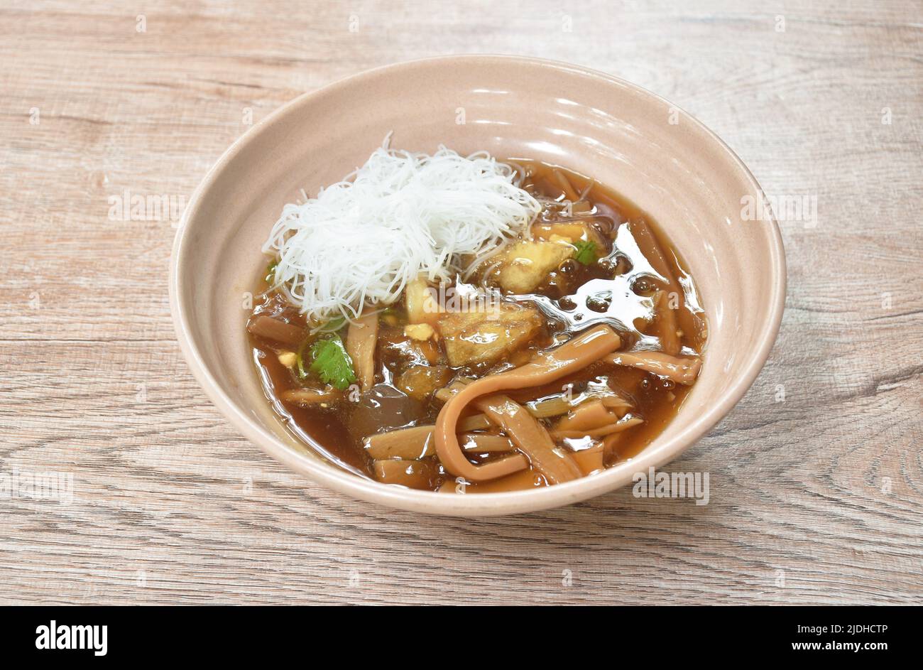 braised fish maw with bamboo shoot topping slice chicken and boiled egg ...