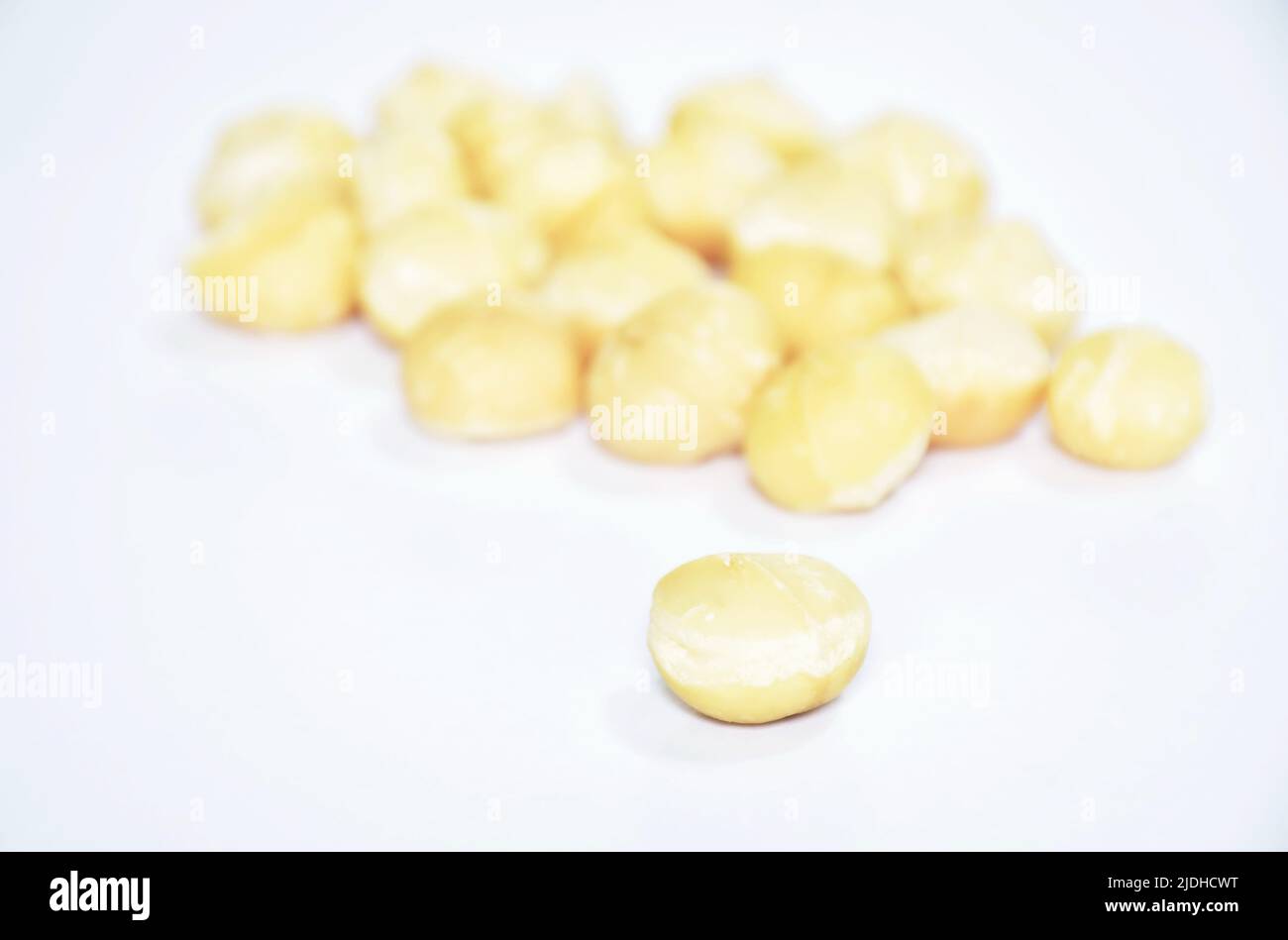 baking macadamia peanut arranging on white background Stock Photo - Alamy