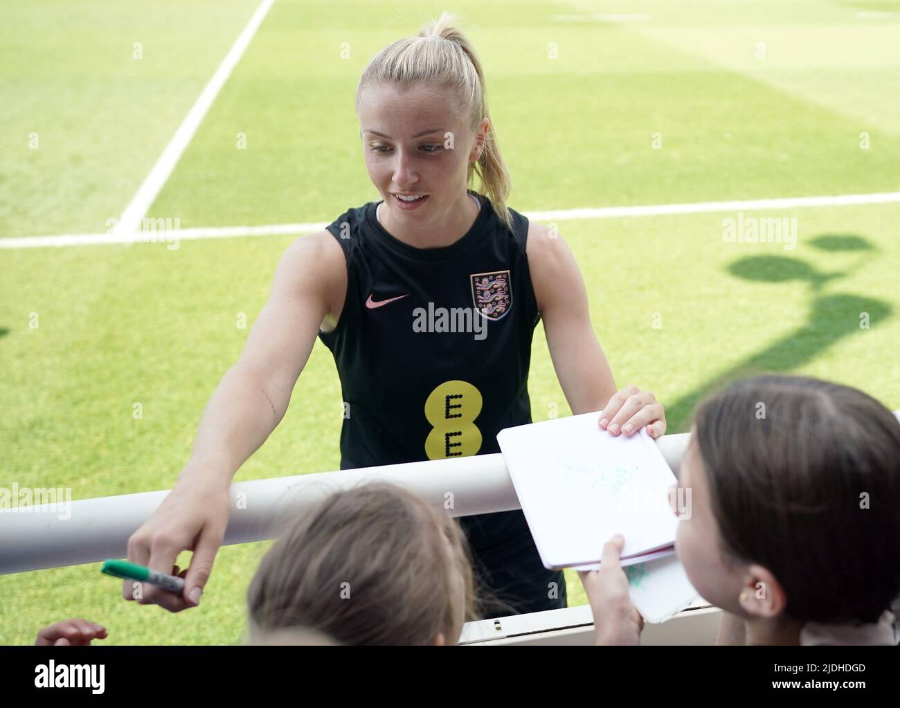 England's Leah Williamson signs autographs for fans after a training ...